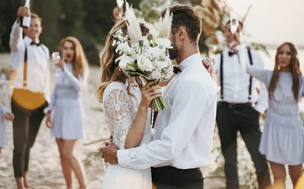 Groom's reaction to surprise under bride's gown leaves entire wedding ...